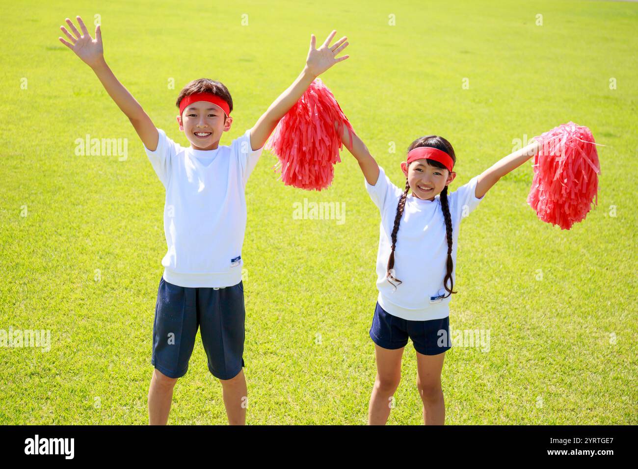 Children cheering in gym clothes Stock Photo - Alamy