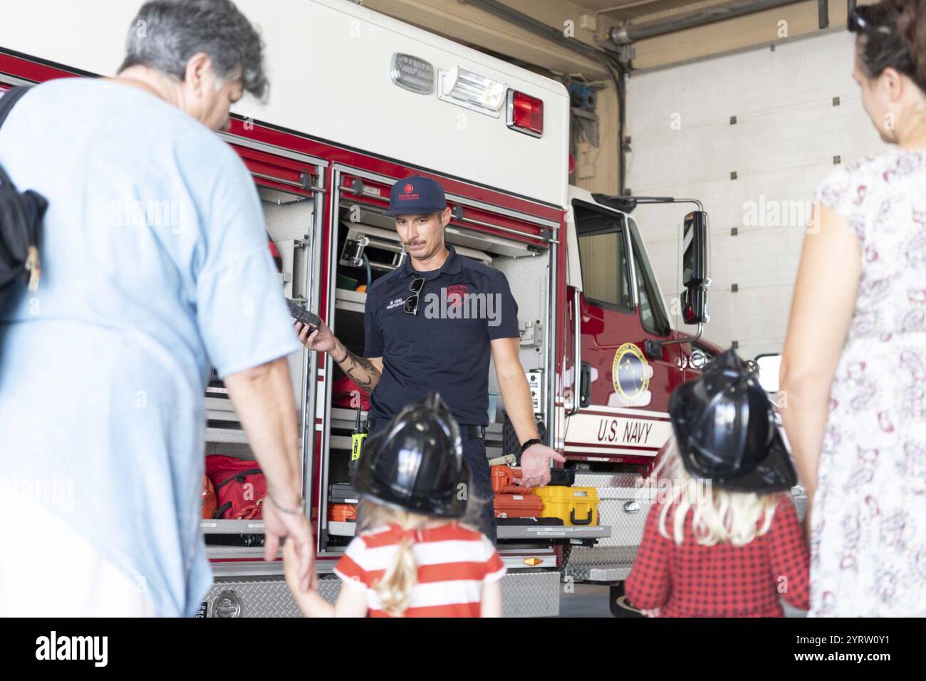 Children visit the NSA Souda Bay Firehouse (8611816 Stock Photo - Alamy