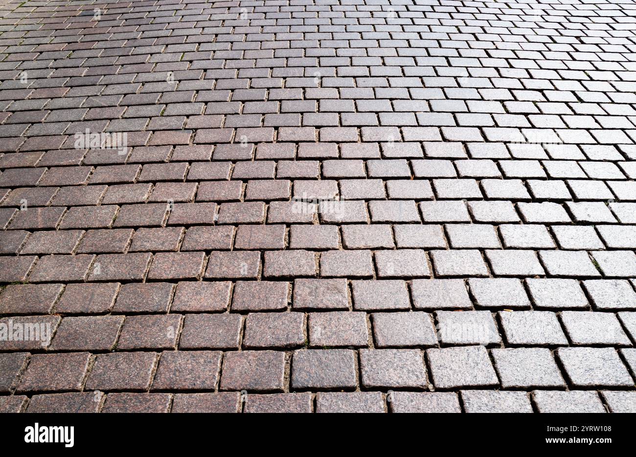 Stone road. Pavement texture. Stonework background for design. Granite cobblestoned pavement ...