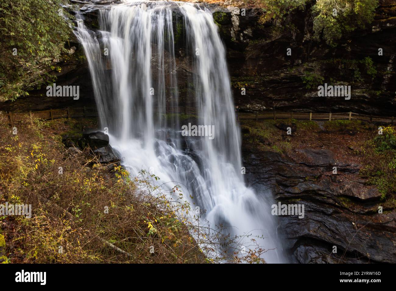 The Dry Falls Trail winding behind its namesake waterfall as the falls ...