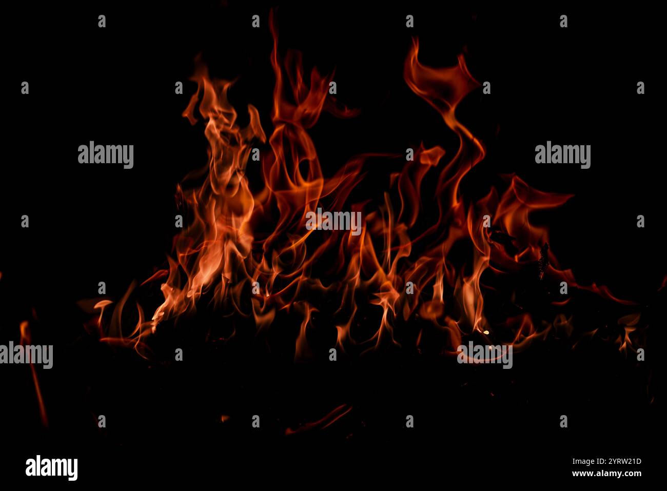 Texture of fire on black background. Hell bonfire. Texture of fire on a ...