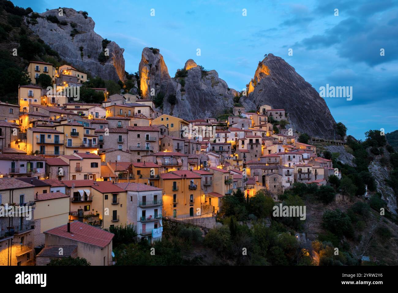 As dusk settles over Castelmezzano Italy , the village's charming ...
