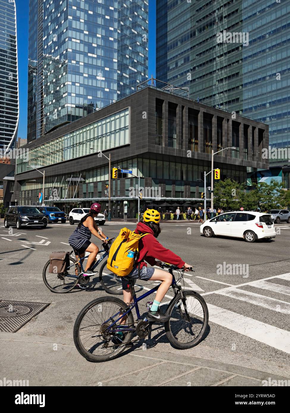 Toronto Canada / Cyclists wait at the intersection of Bay Street and ...