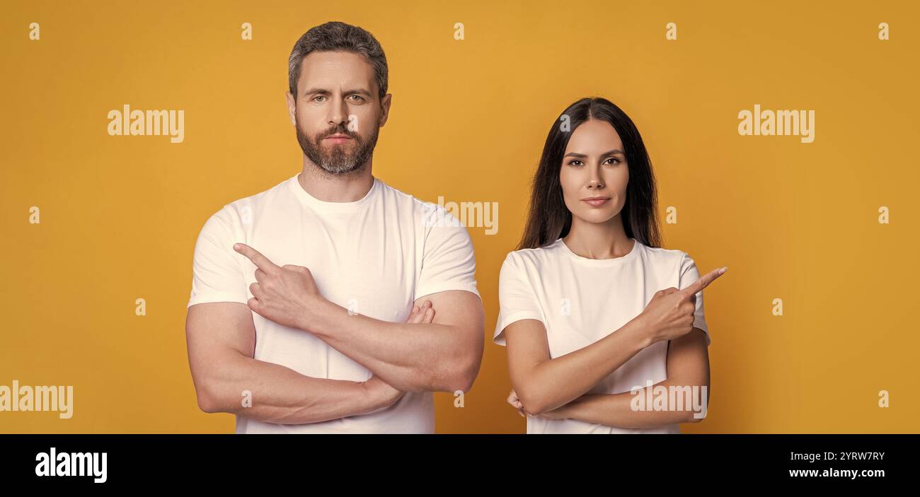 Offer from millennial couple. Boyfriend and girlfriend point finger ...