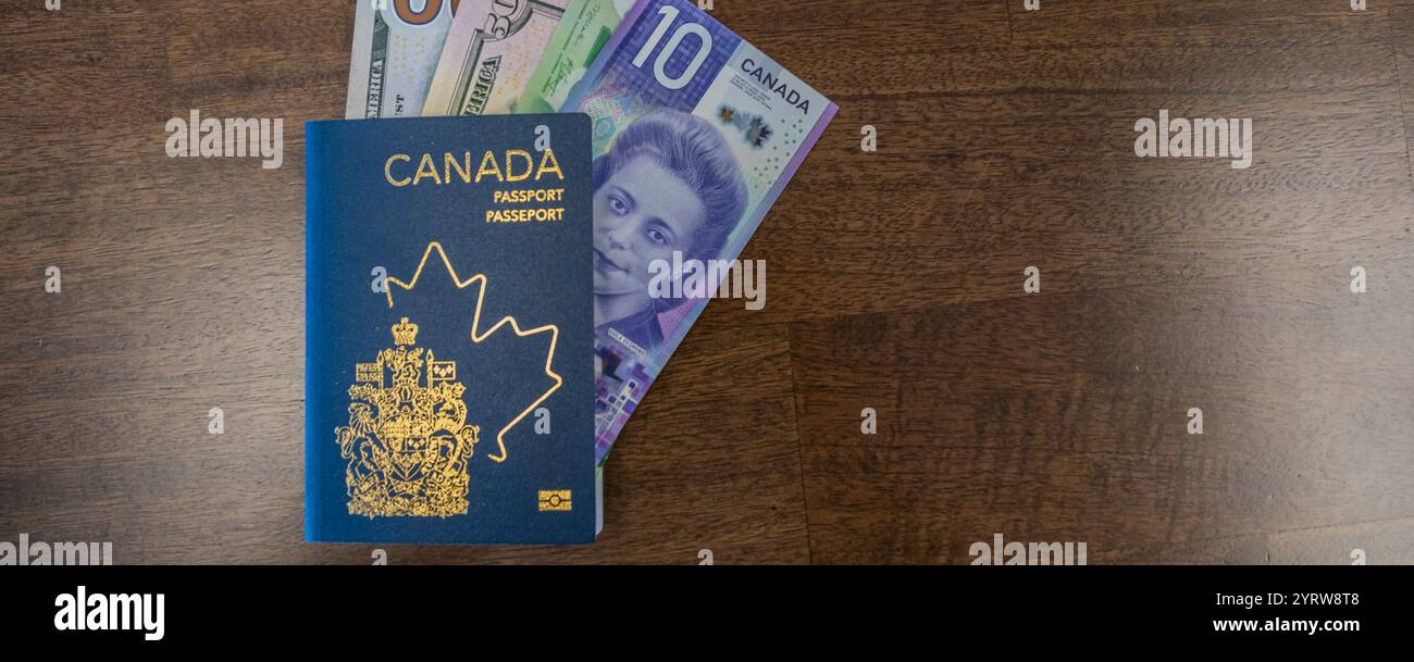 New Canadian Passport with Canadian and US Dollars bank notes Stock ...