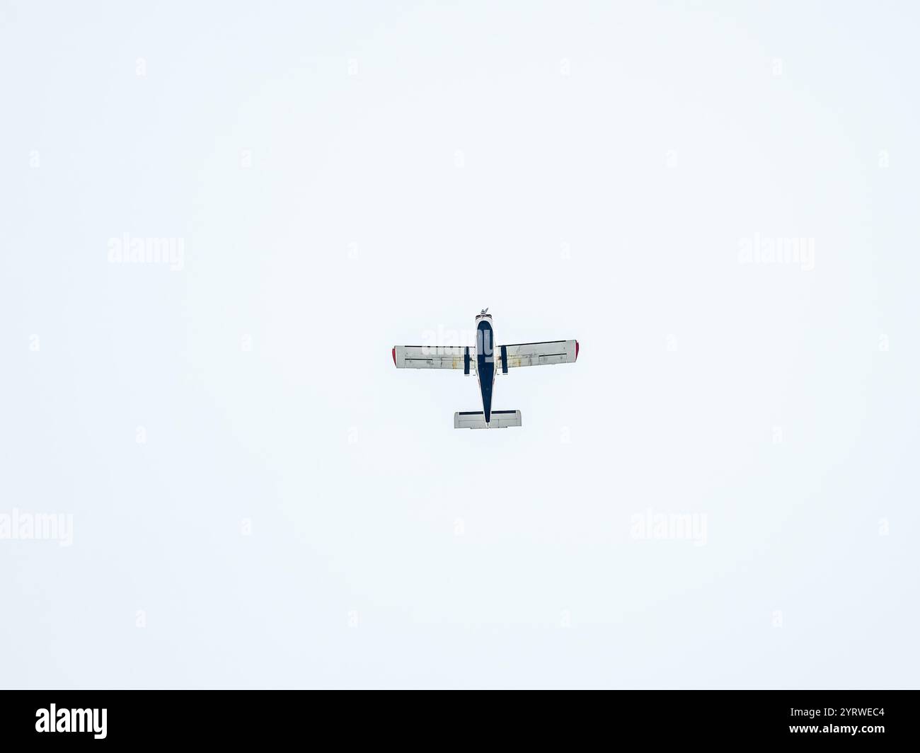 Small ultralight airplane with overhead wing and single propeller ...