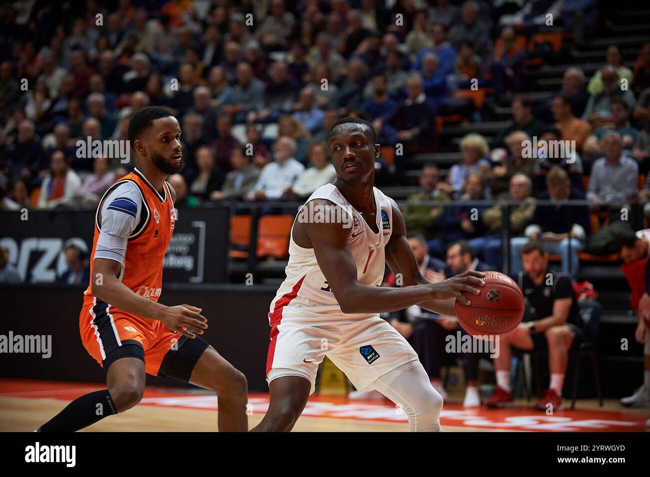 Jean Montero of Valencia Basket (L) and Jared Harper of Hapoel Bank ...