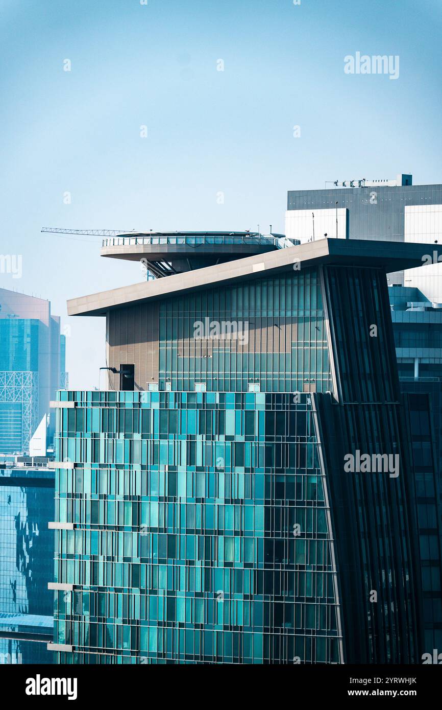Unique modern skyscraper design in Doha, Qatar Stock Photo - Alamy