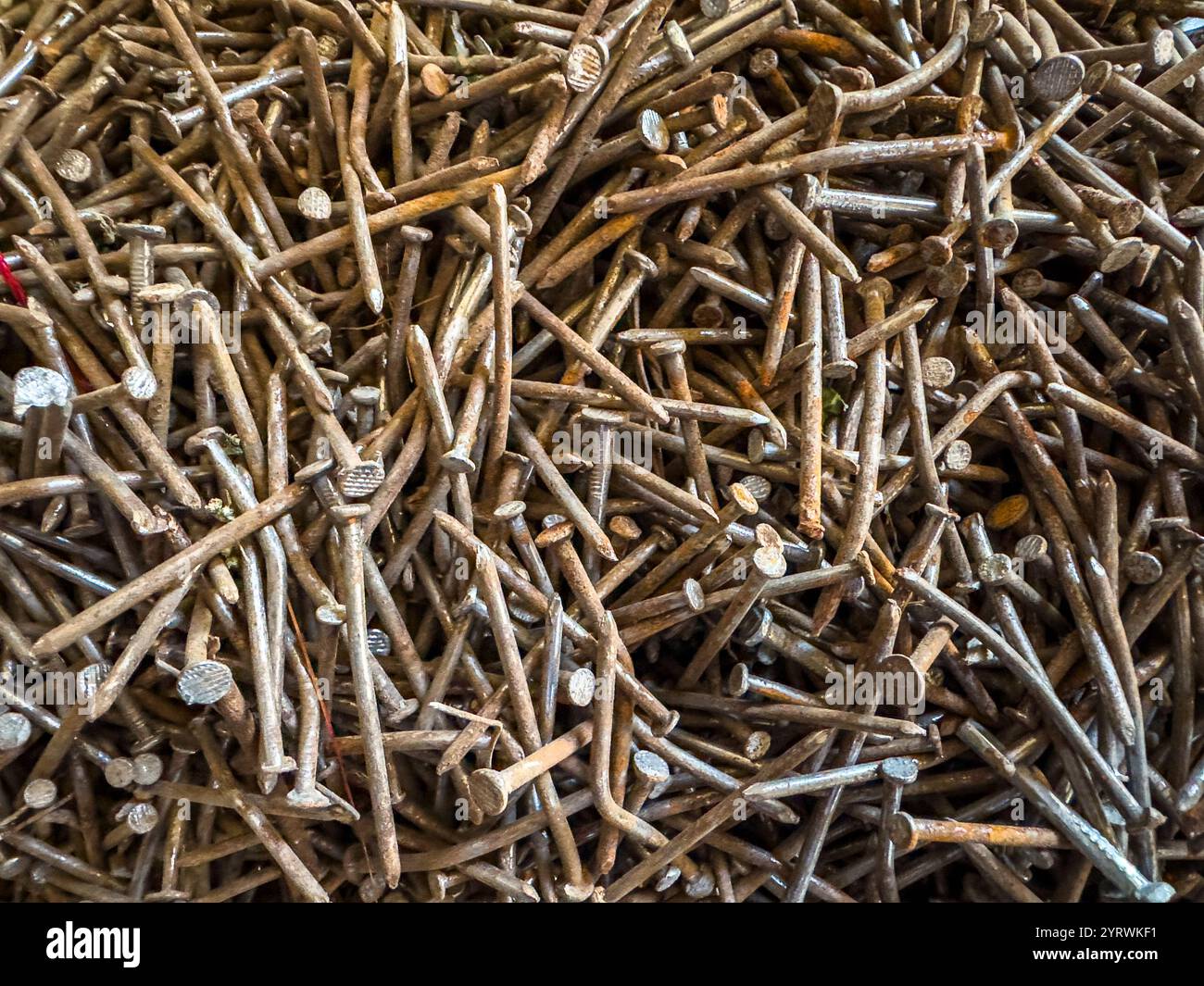 Pile of rusty nails from construction. Used scrap nails closeup Stock ...