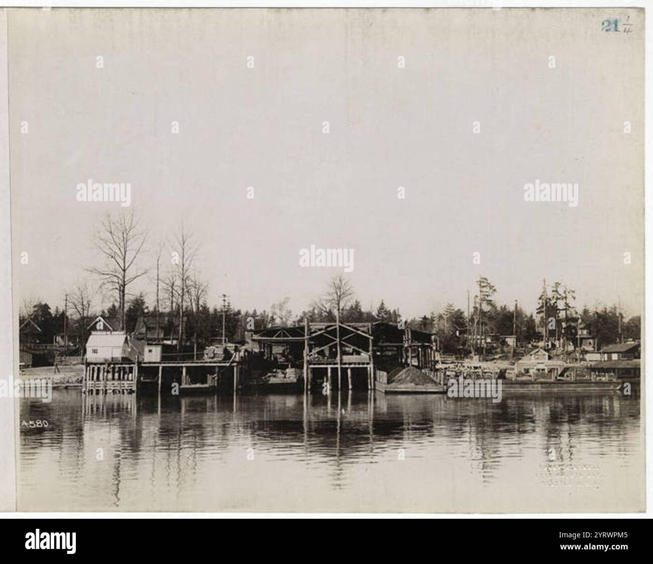 Coal yard at Madison Park showing lake frontage and barges, Seattle, ca ...