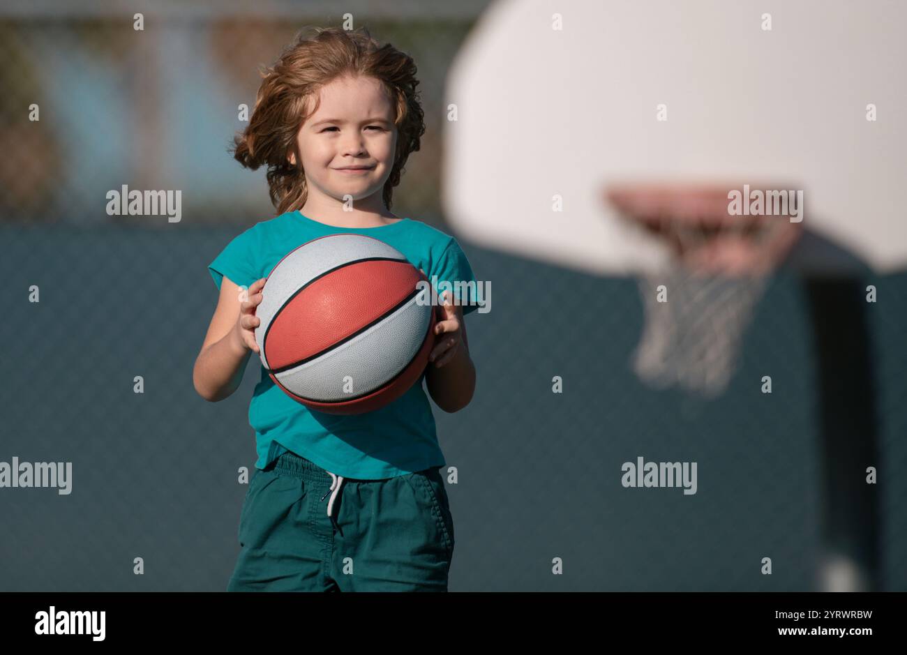 Kid boy face concentrated on playing basketball. Sport for kids Stock ...
