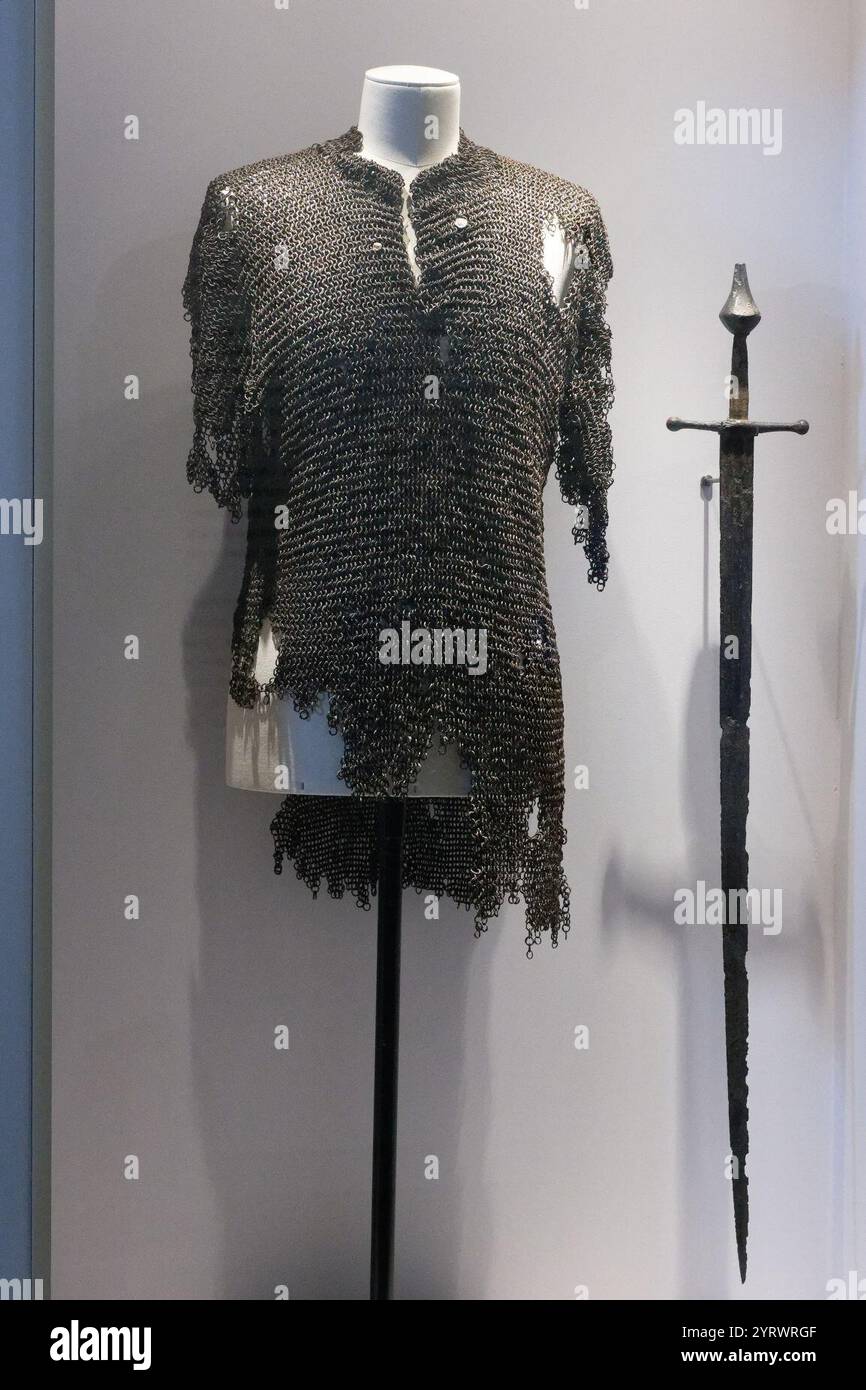 Coat of mail Musee de Normandie and sword Armee Stock Photo - Alamy