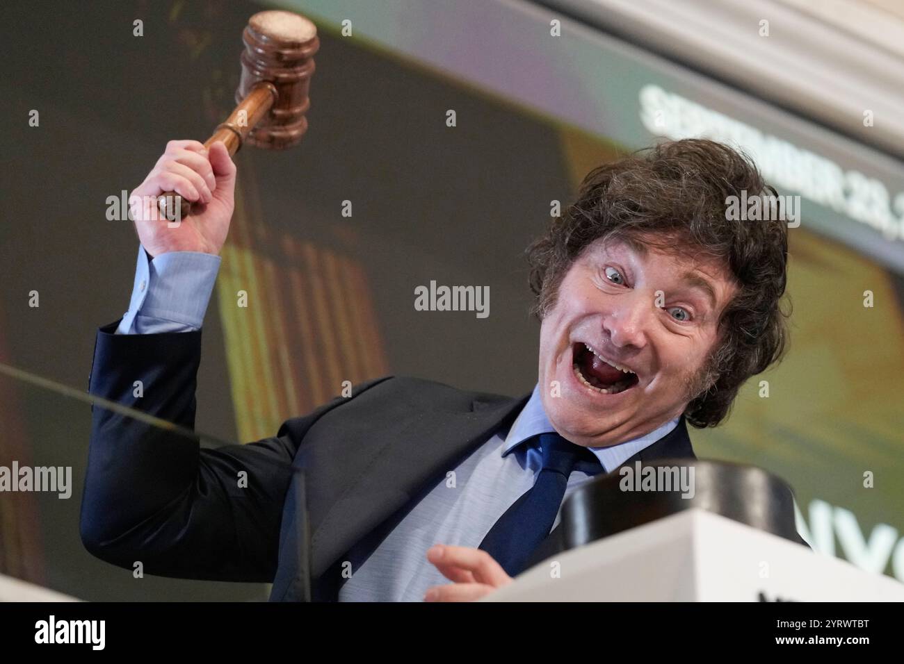 Argentina's President Javier Milei poses for pictures after ringing the ...