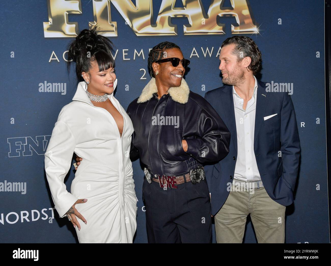 Rihanna, left, A$AP Rocky and Puma's Arne Freundt attend the 38th ...