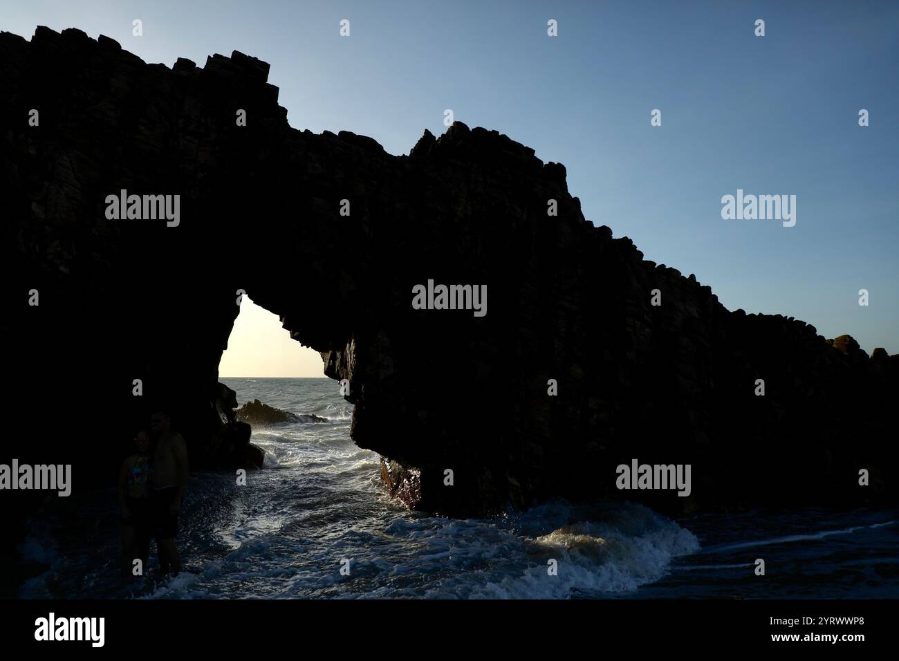 The pedra furada an arched rock formation on a beach in Jericoacoara in ...