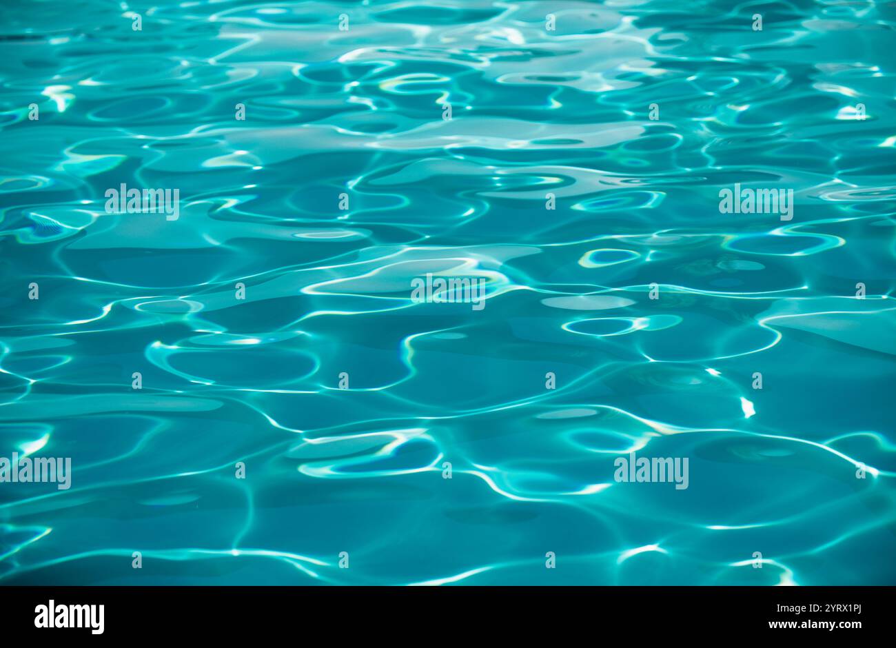 Abstract ripple wave and clear turquoise water surface in swimming pool ...