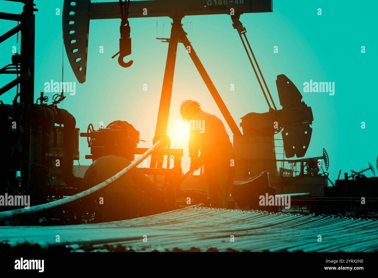The oil workers at work Stock Photo - Alamy