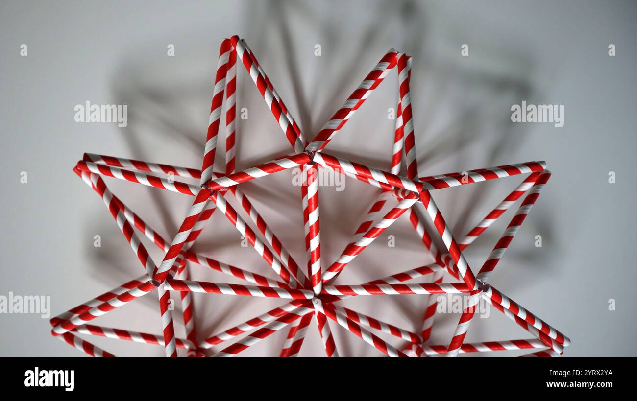 Star. Hand made home decoration. Half visible from the lower background ...