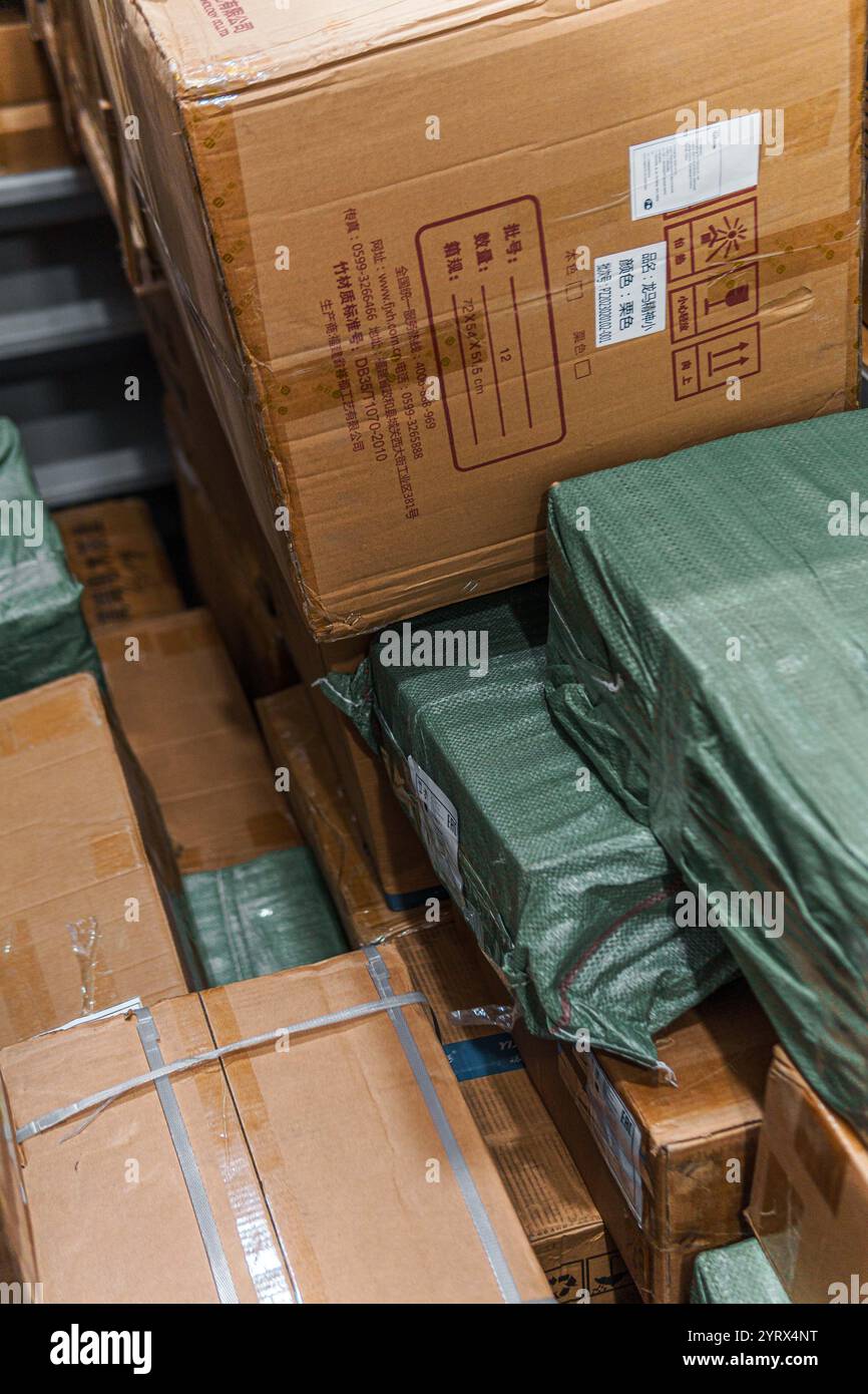 Boxes are carefully packed and organized in warehouse storage for ...