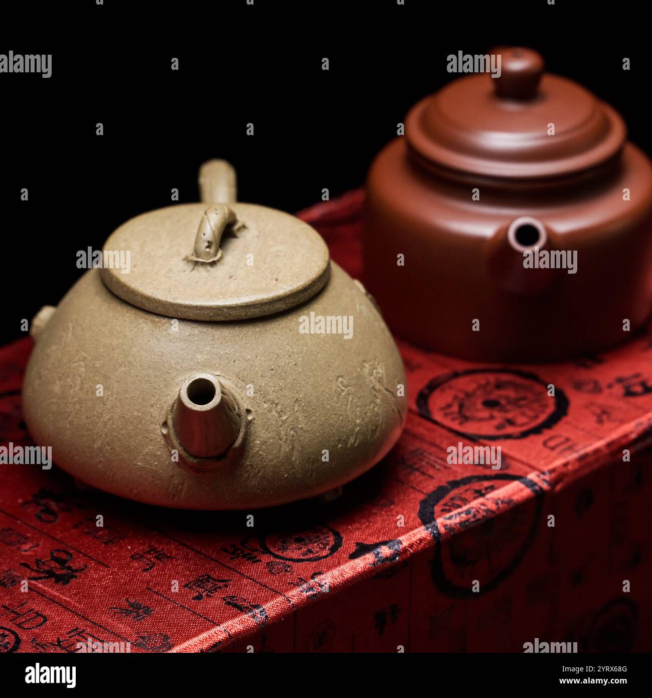 Traditional Chinese Tea Pots beautifully displayed on vibrant ...