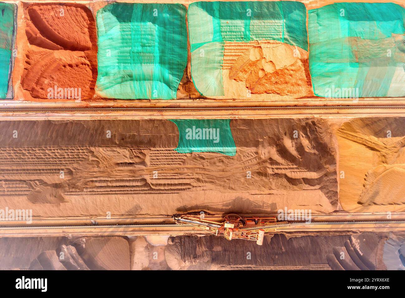 QINGDAO, CHINA - DECEMBER 5, 2024 - A pile of imported iron ore is seen ...