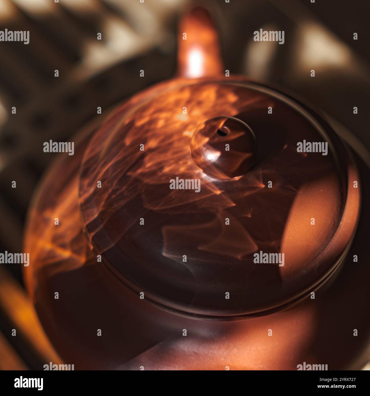 An Elegant Teapot Featuring Captivating Light Reflections That Enhance ...