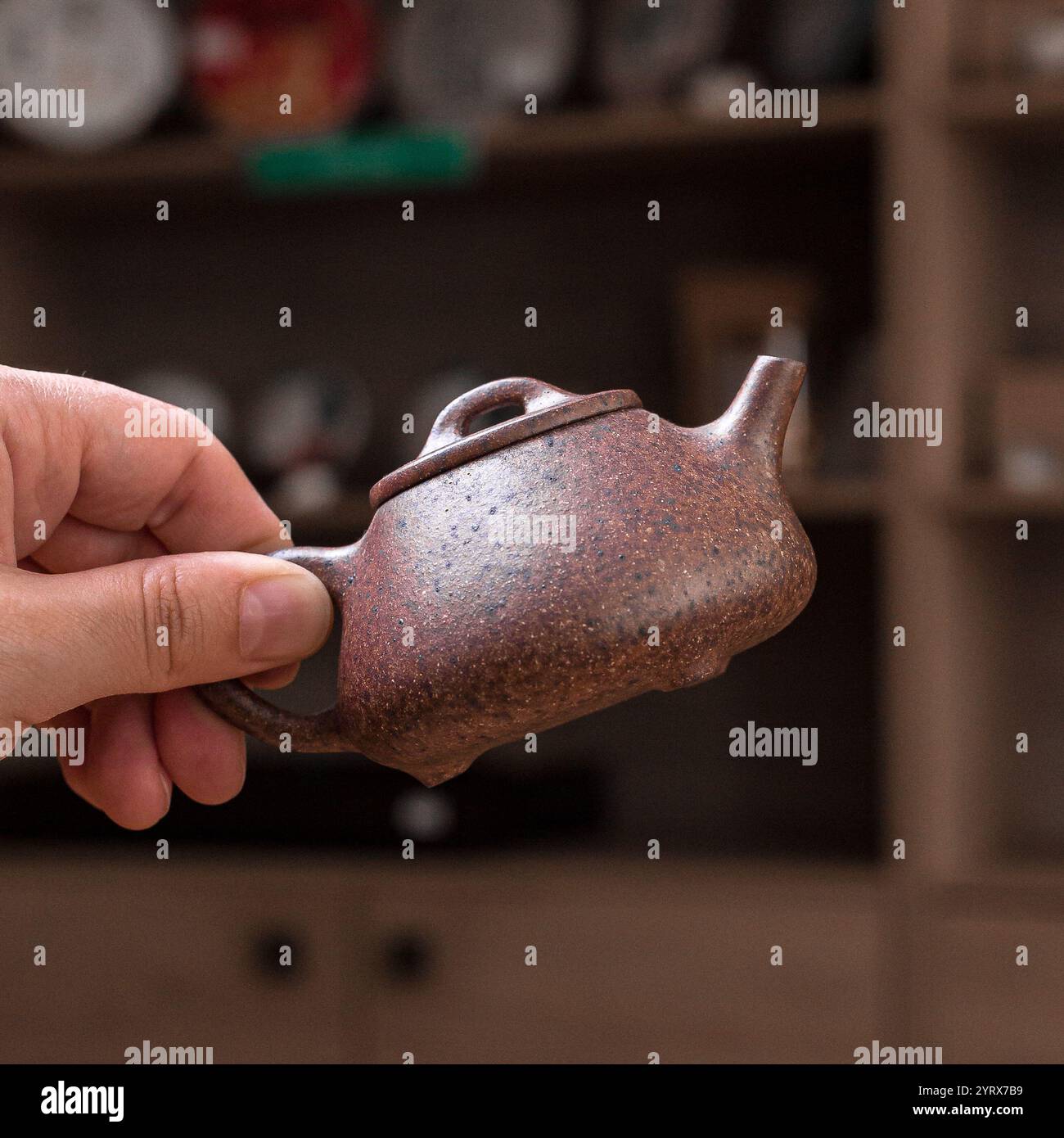 This beautifully crafted Handheld Teapot features a charming and Rustic ...