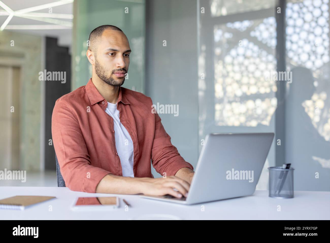 Diligently typing on a hi-res stock photography and images - Alamy