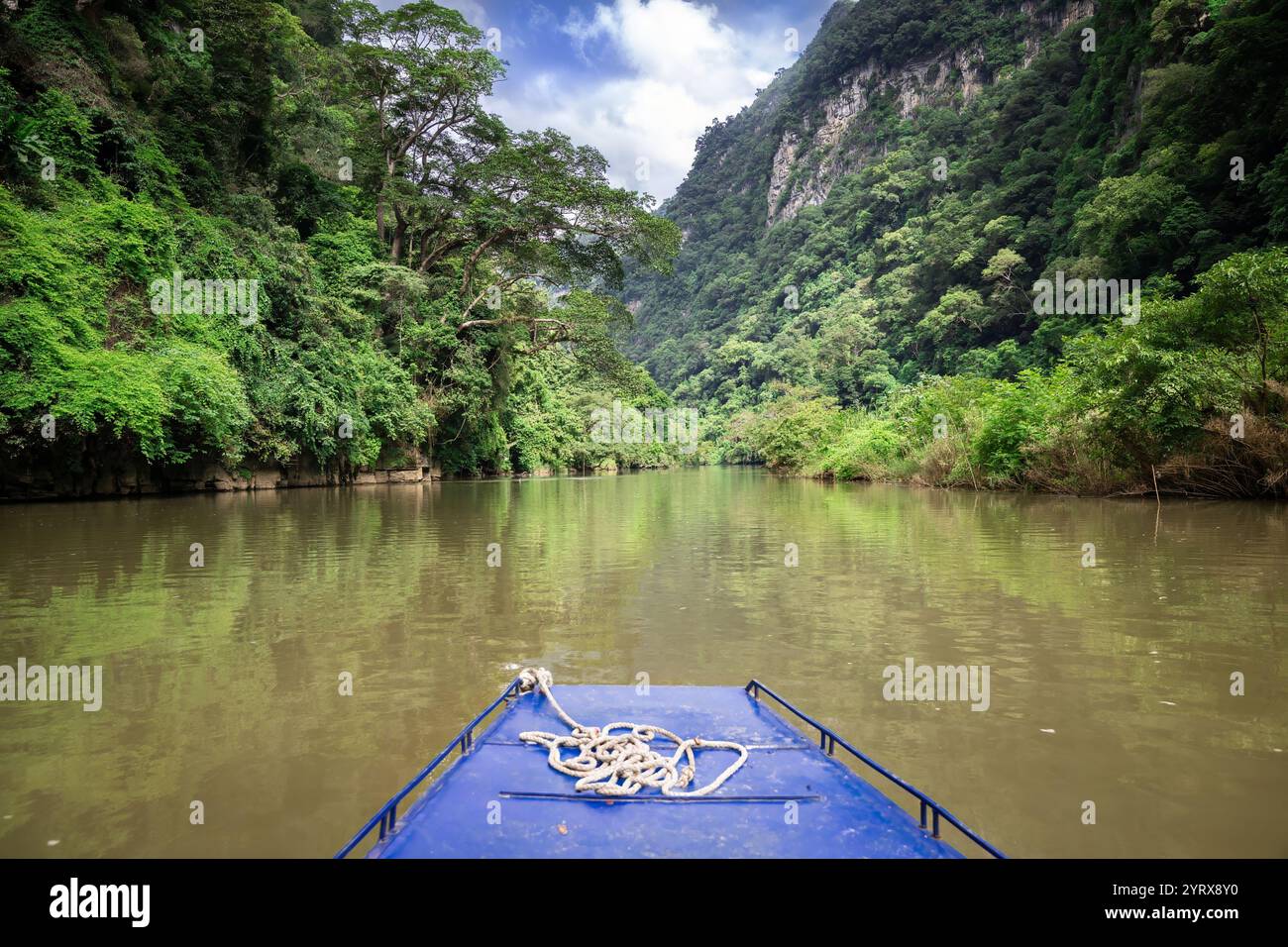 A boat travelling on Ba Be Lake in Ba Be National Park in Bac Kan ...