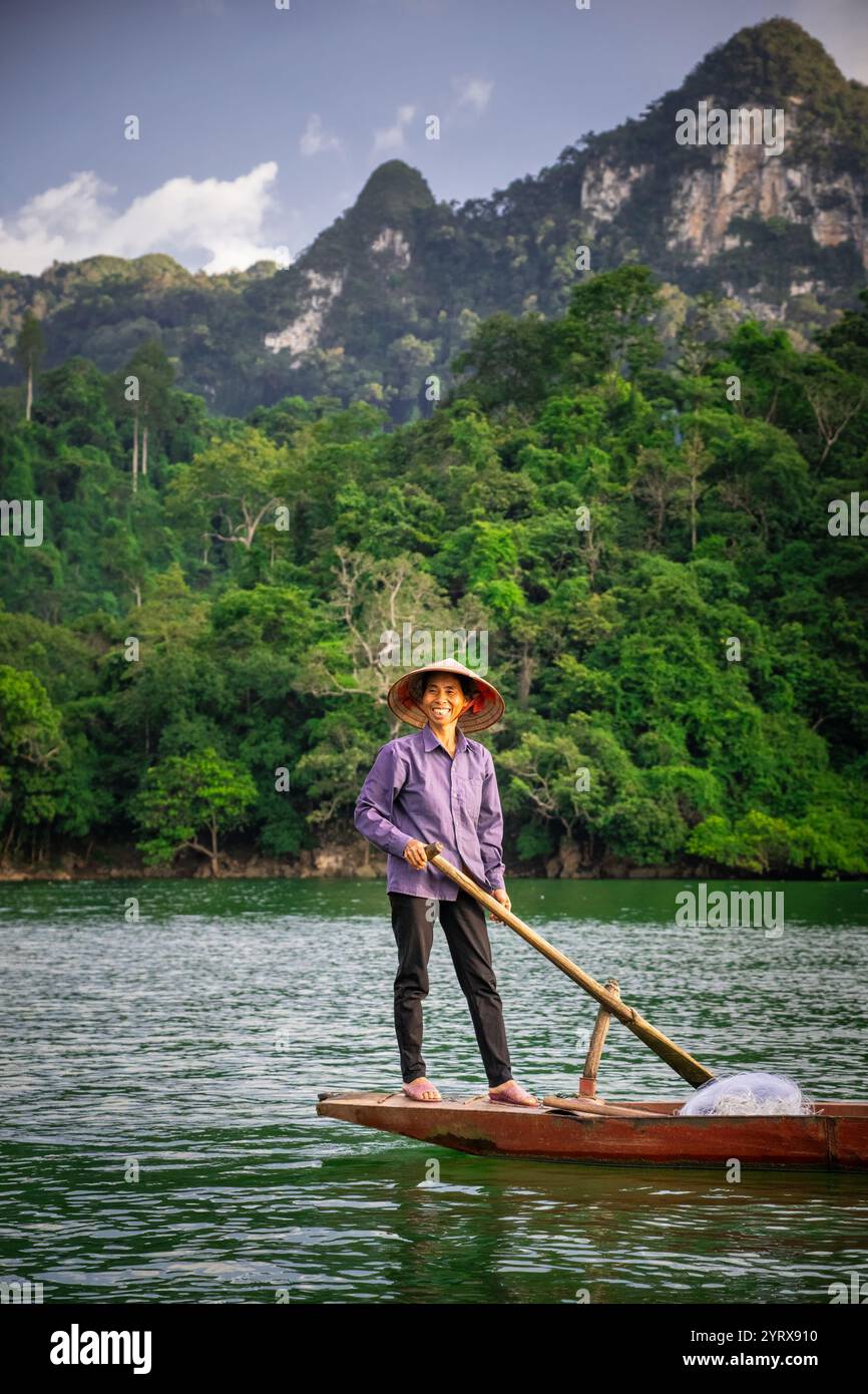 A woman fishing on Ba Be Lake in Ba Be National Park in Bac Kan ...