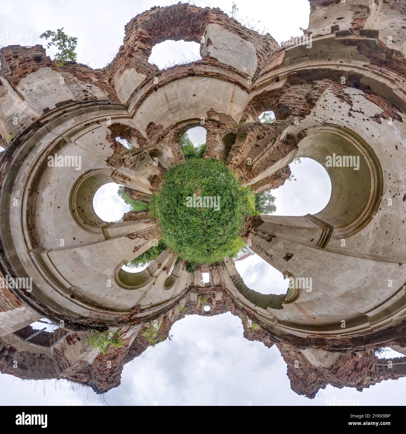 tiny planet in blue sky with clouds of old abandoned ruined church ...