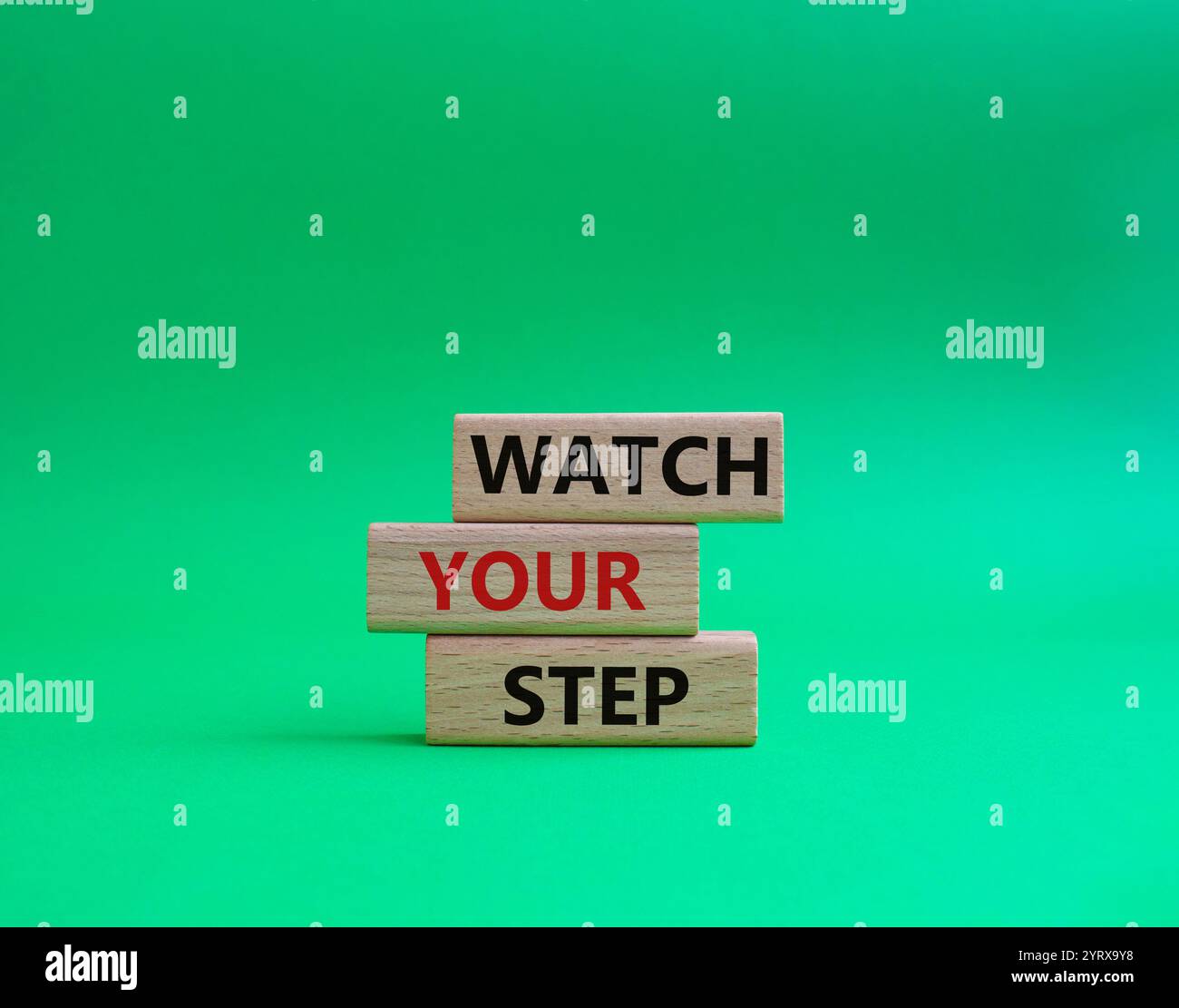 Watch your Step symbol. Concept words Watch your Step on wooden blocks ...