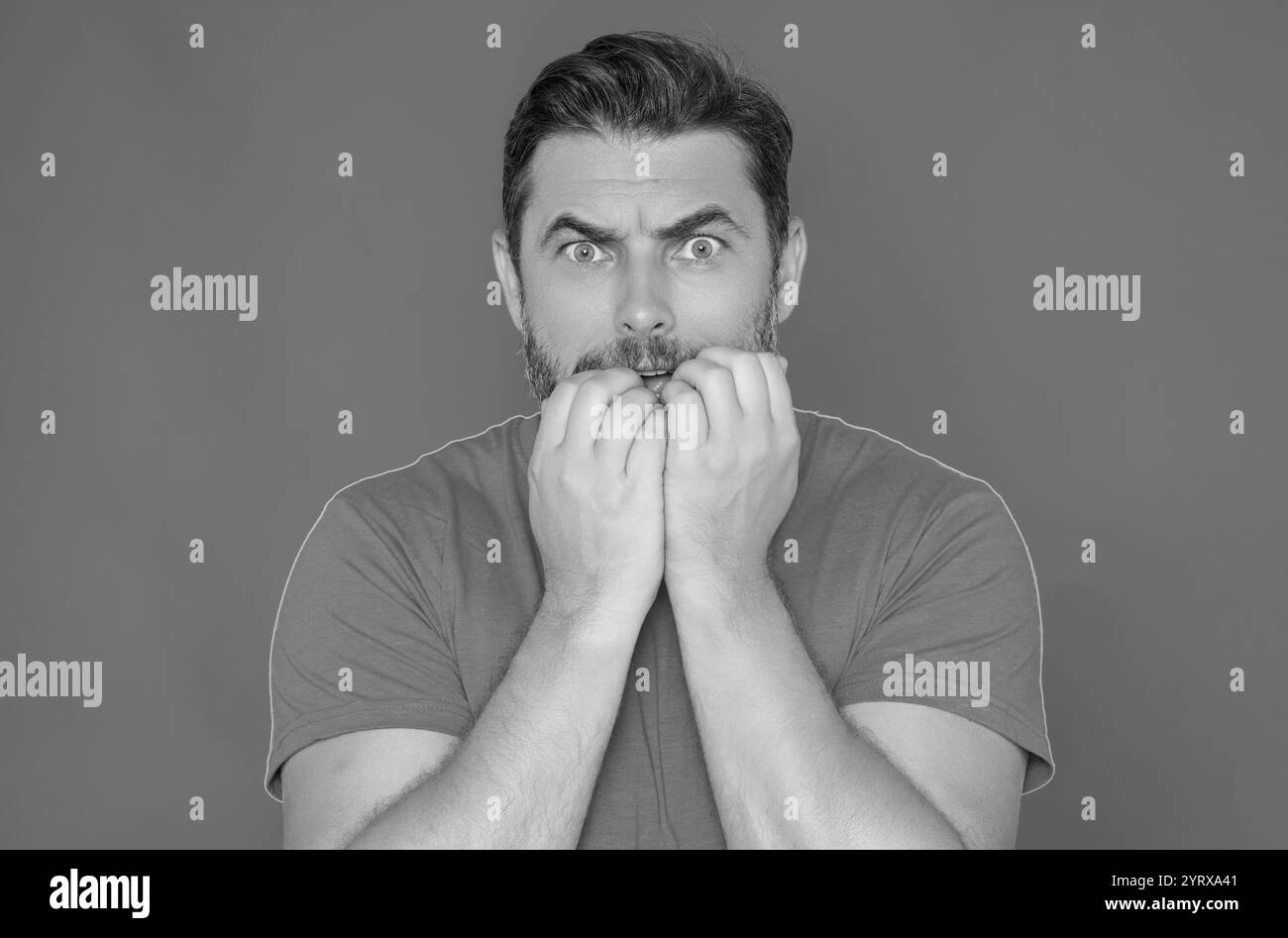 Portrait of shocked amazed excited scared man. Handsome middle age senior man worried, nervous ...