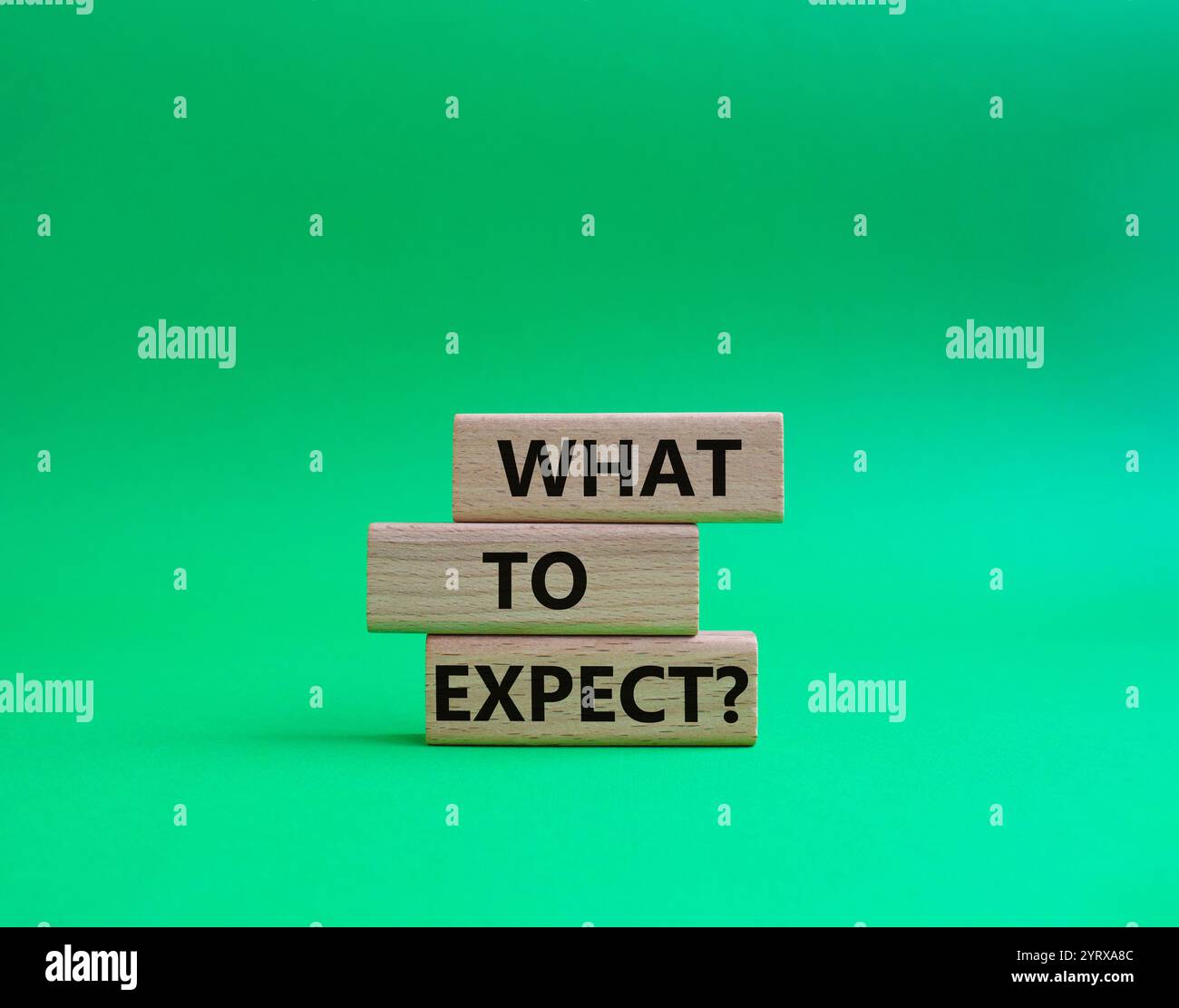What to Expect symbol. Concept words What to Expect on wooden blocks ...