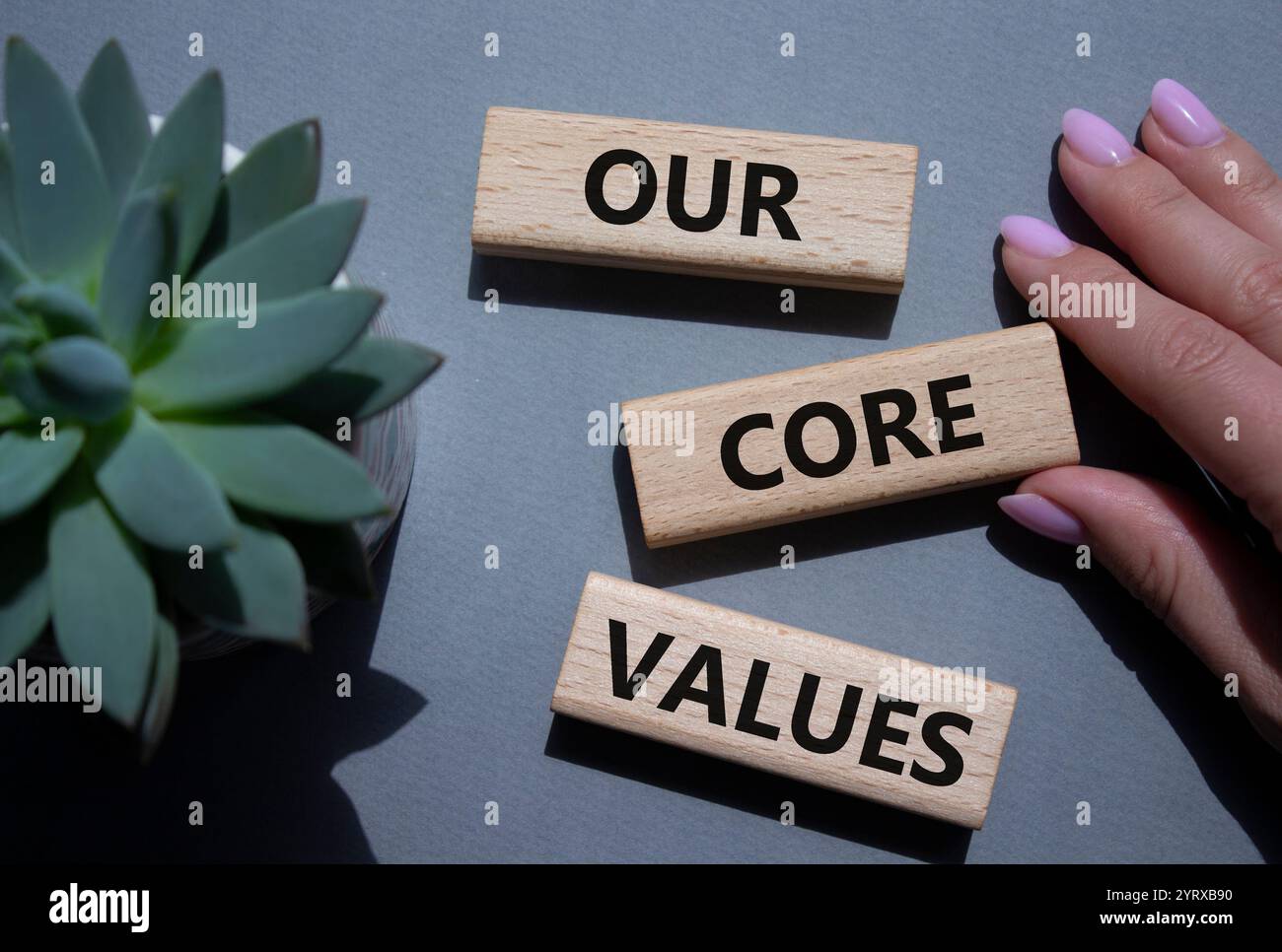 Our core values symbol. Concept words Our core values on wooden blocks ...