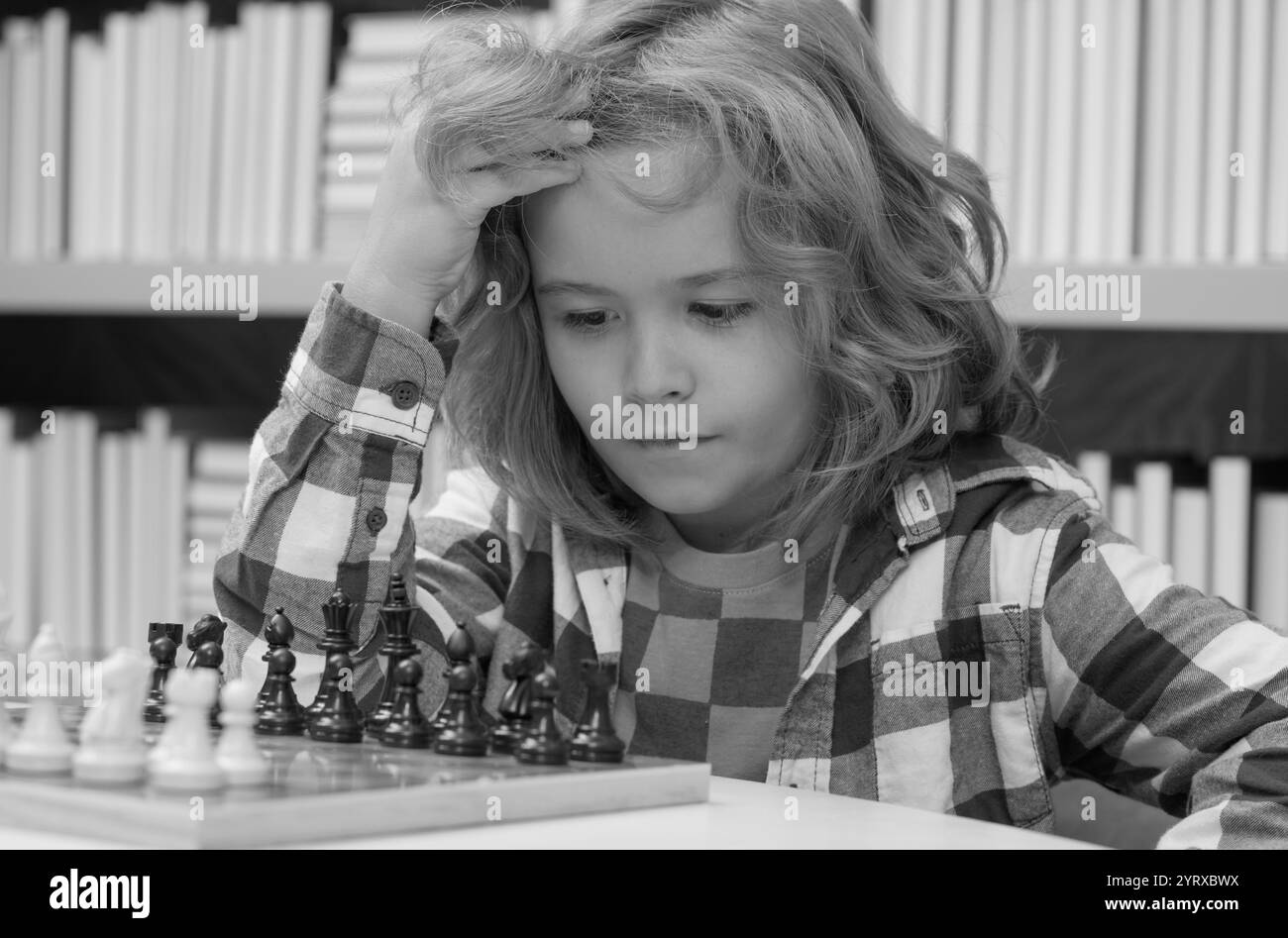 Chess school. Little kid play chess. Thinking child. Chess game for ...
