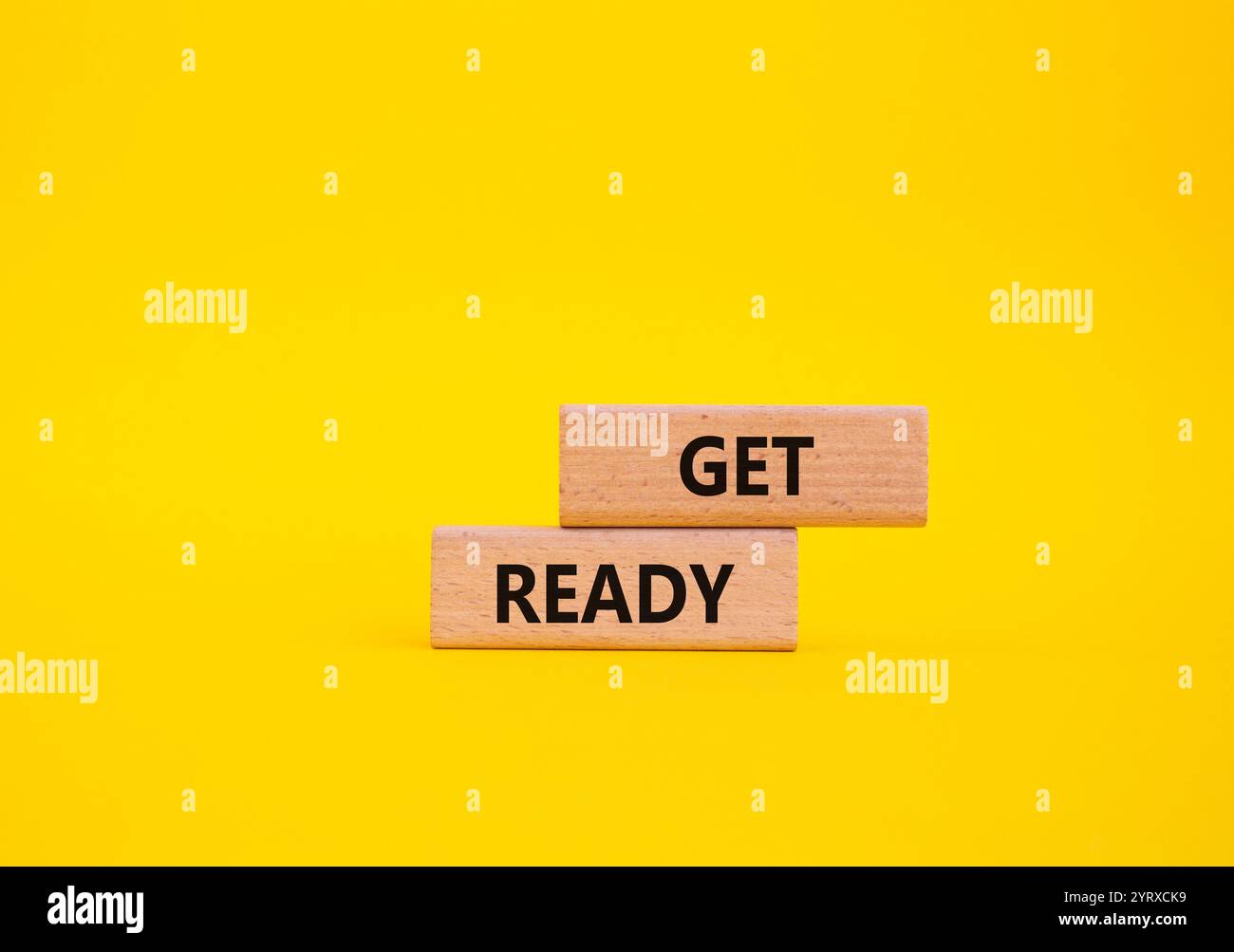Get ready symbol. Wooden blocks with words Get ready. Beautiful yellow ...