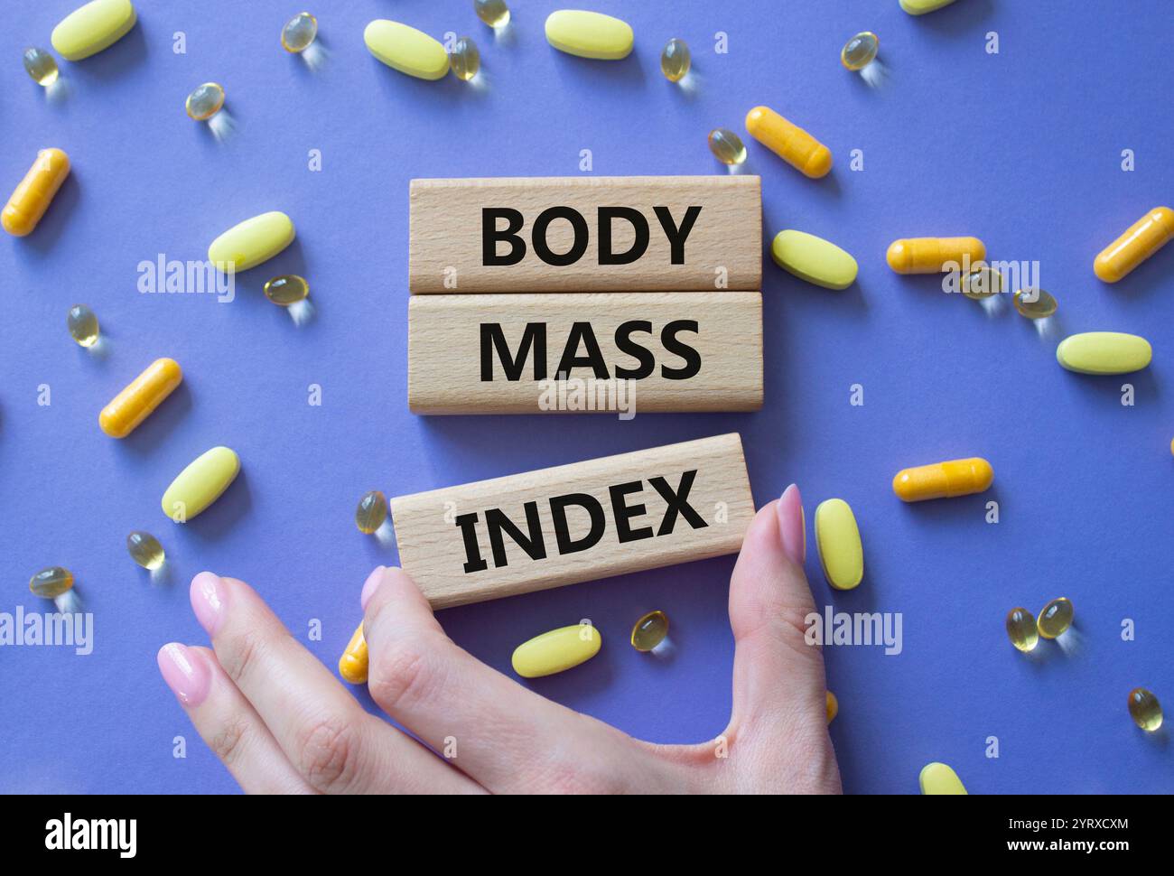 Body Mass Index symbol. Concept word Body Mass Index on wooden blocks ...