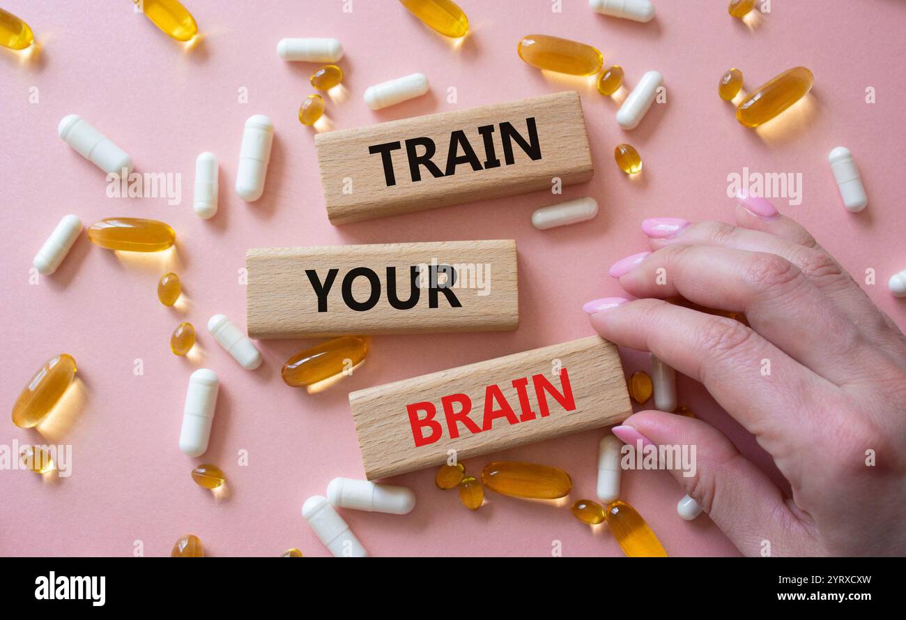 Train Your Brain symbol. Concept words Train Your Brain on wooden ...