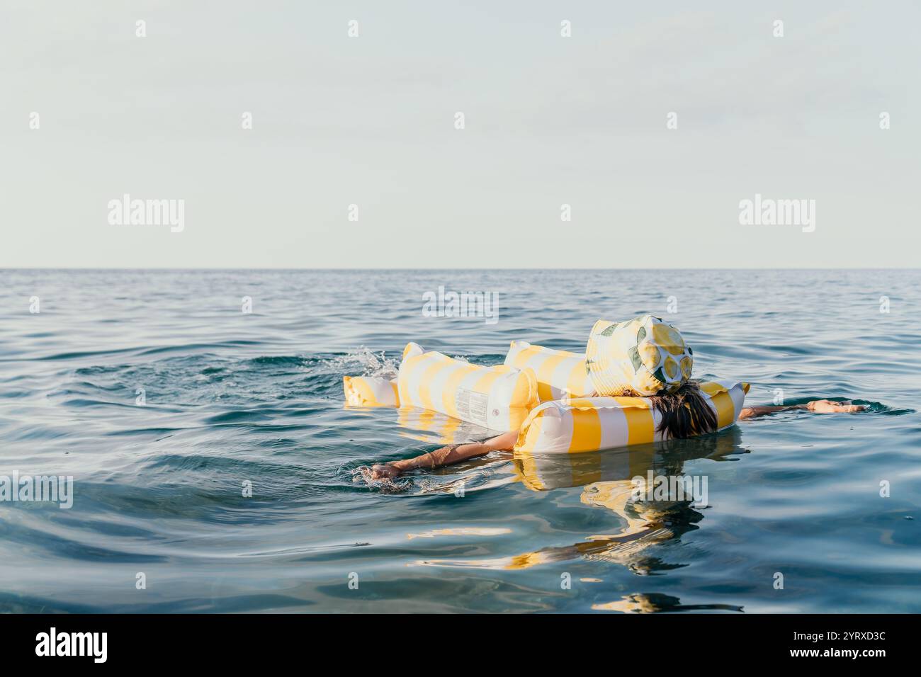 Life Raft Sea Rescue Emergency - A yellow and white life raft floats in ...
