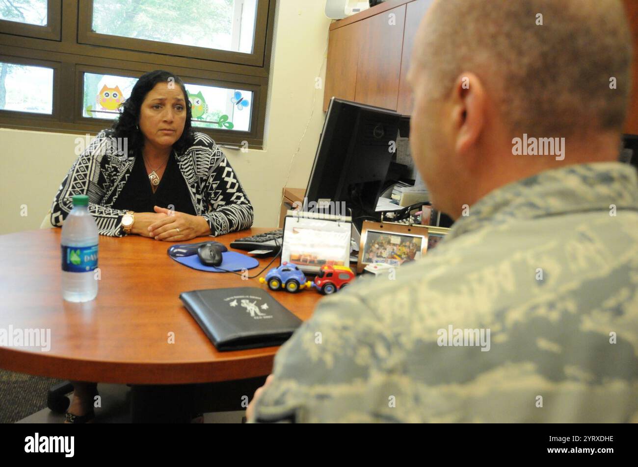 Command Chief Hotaling accepts coin Stock Photo - Alamy