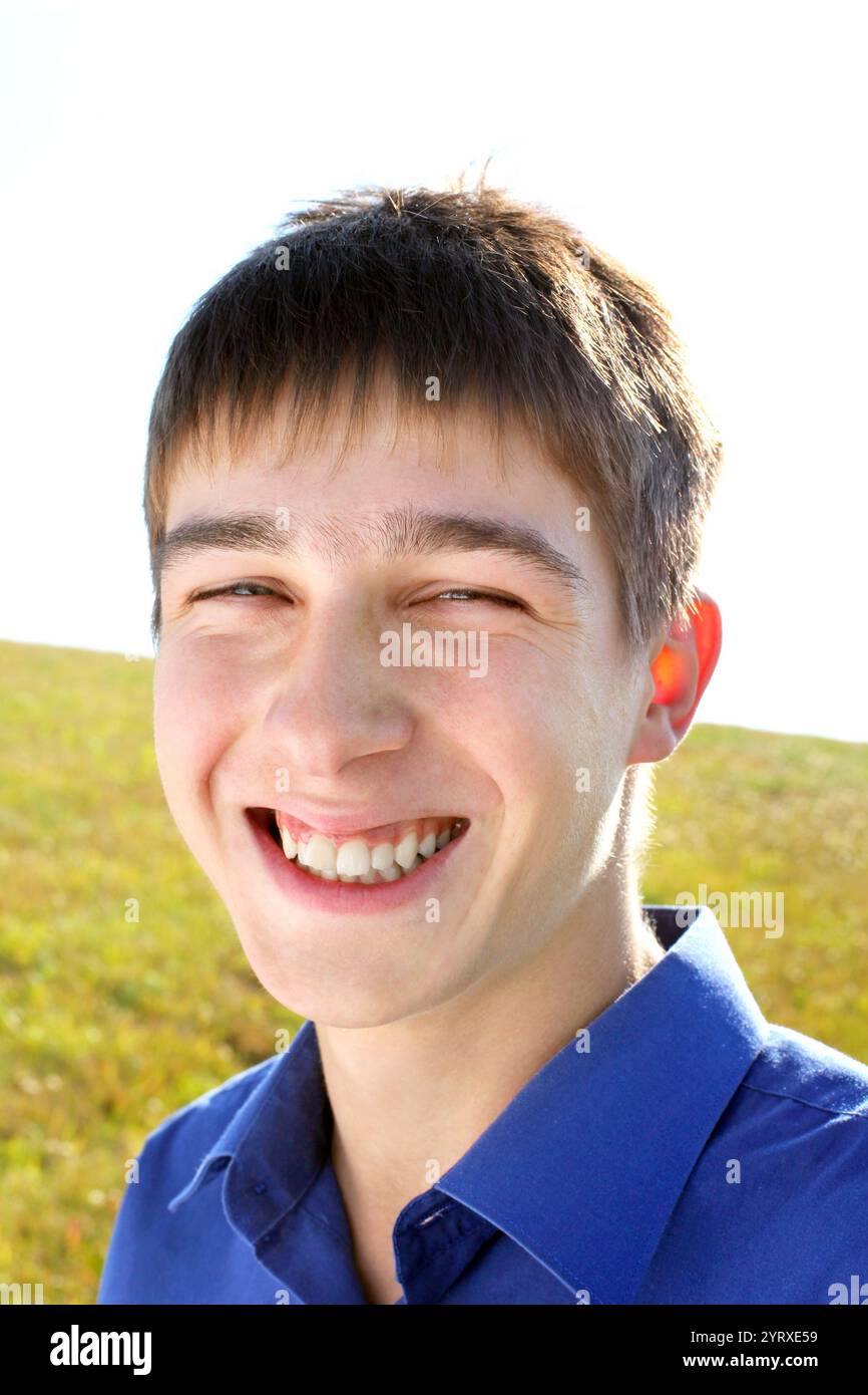 happy and smiling teenager portrait outdoor Stock Photo - Alamy