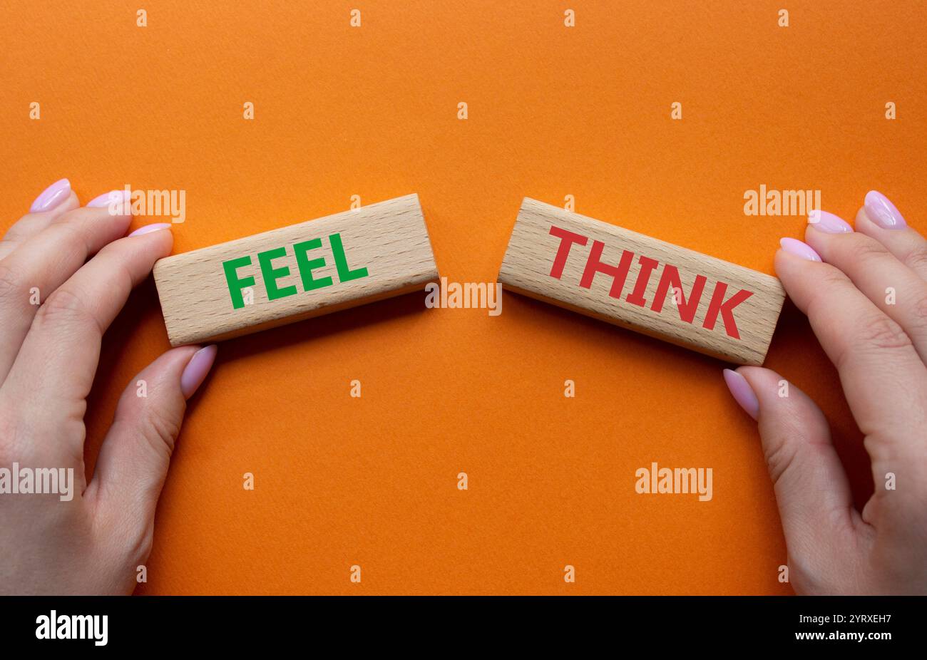 Think or Feel symbol. Concept word Think or Feel on wooden blocks ...