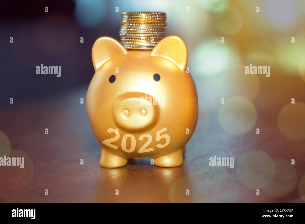 Baby pig with coins on top and the numbers 2025 ,concept of new year ...