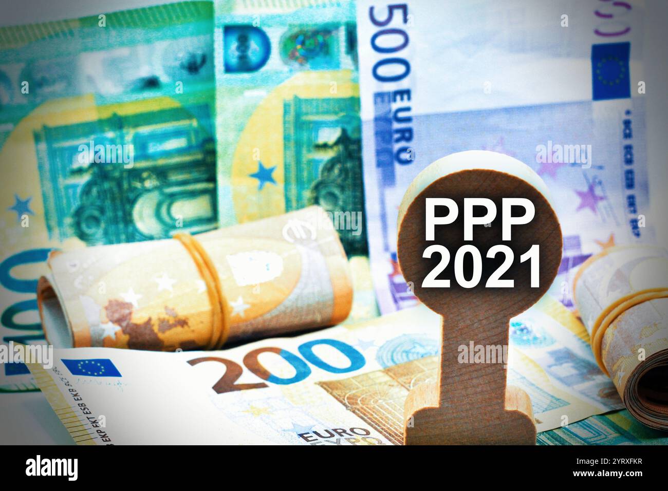 Banknotes with the wooden sign "PPP 2021" Business concept Stock Photo ...