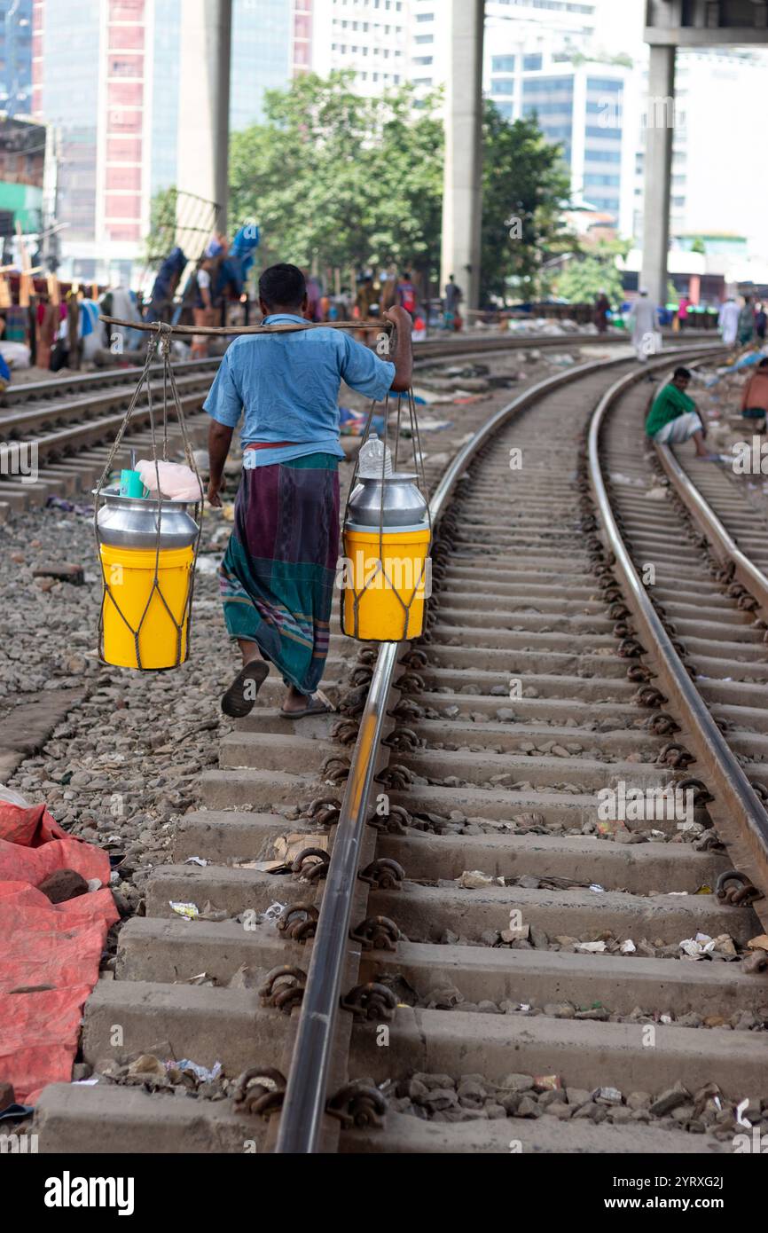 December 5, 2024, Dhaka, Dhaka, Bangladesh: Life along the railway tracks in Dhaka's Kawran ...