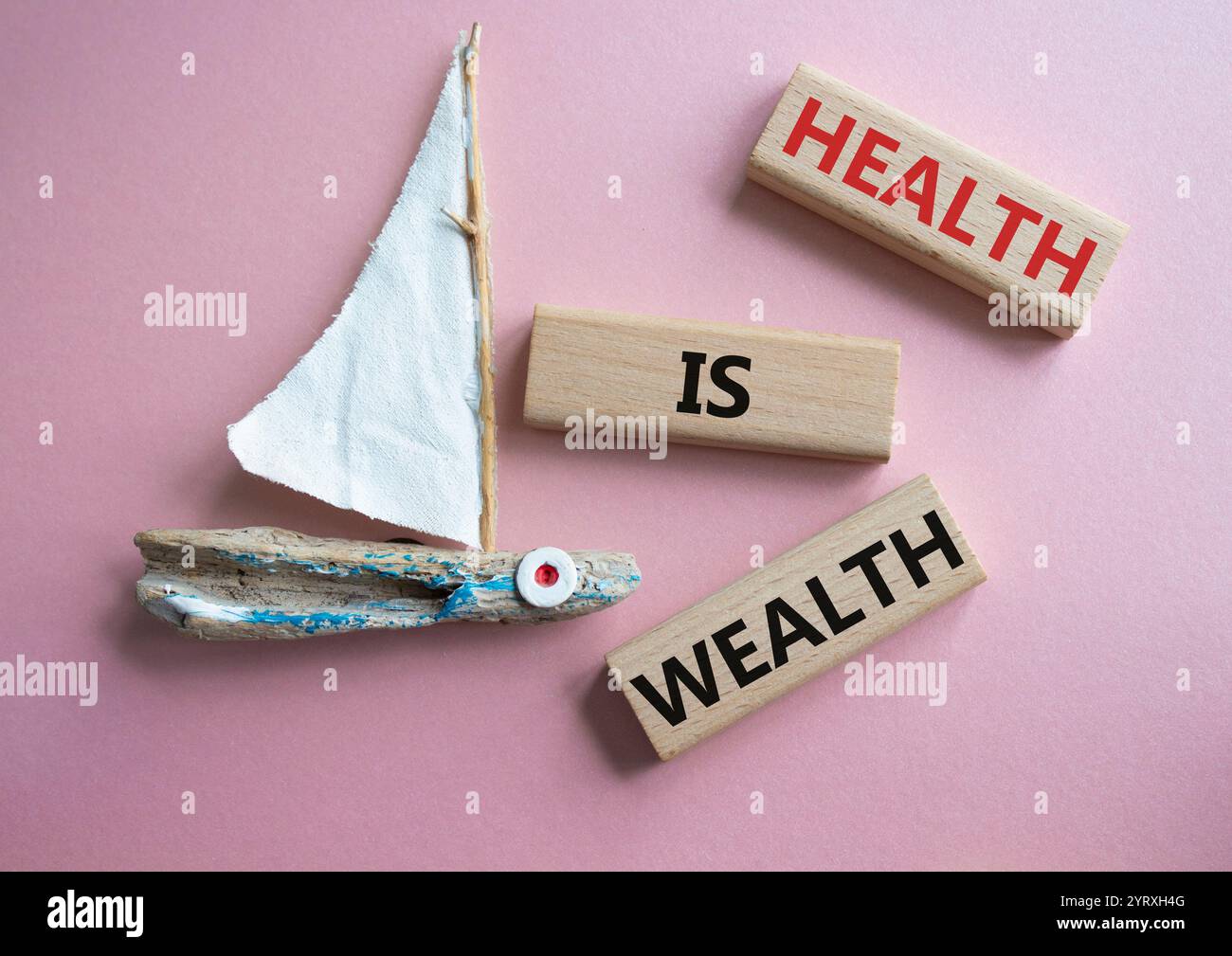Health is Wealth symbol. Concept word Health is Wealth on wooden blocks ...