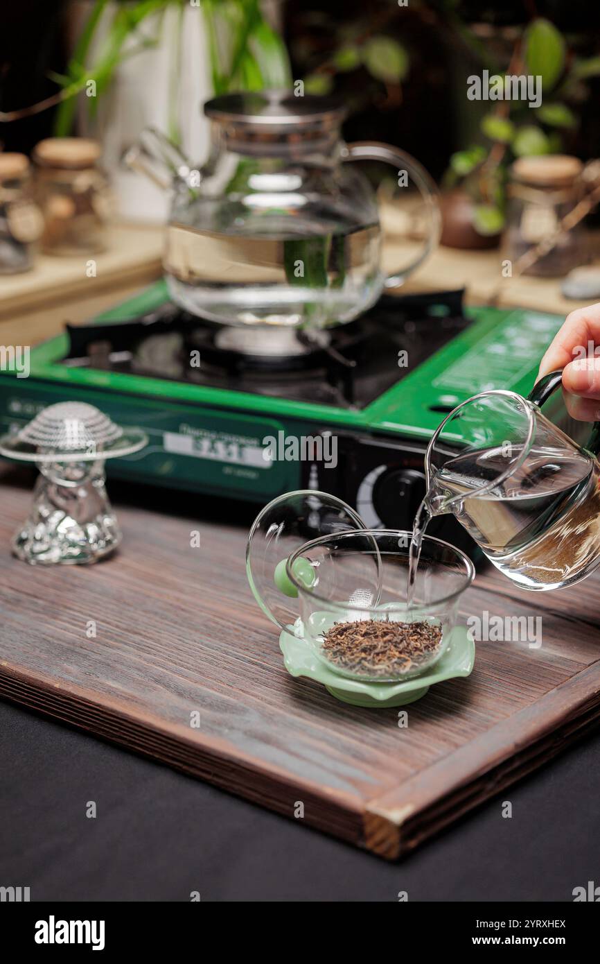 An Elegant Tea Brewing Setup with a Teapot and Loose Tea Leaves for a ...