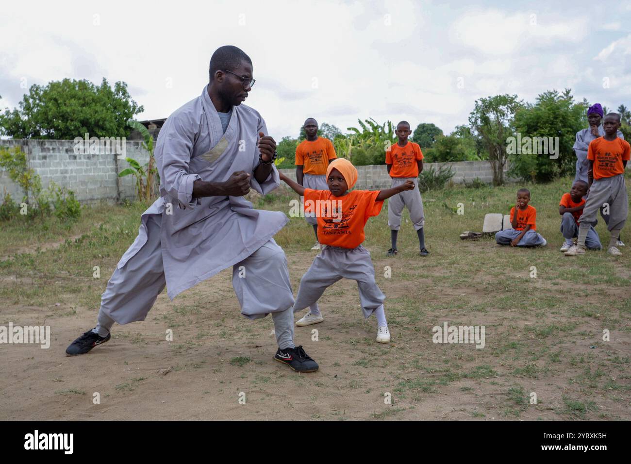 Dar Es Salaam, Tanzania. 30th Nov, 2024. Mariam Saidi Mfaume (2nd L), a ...