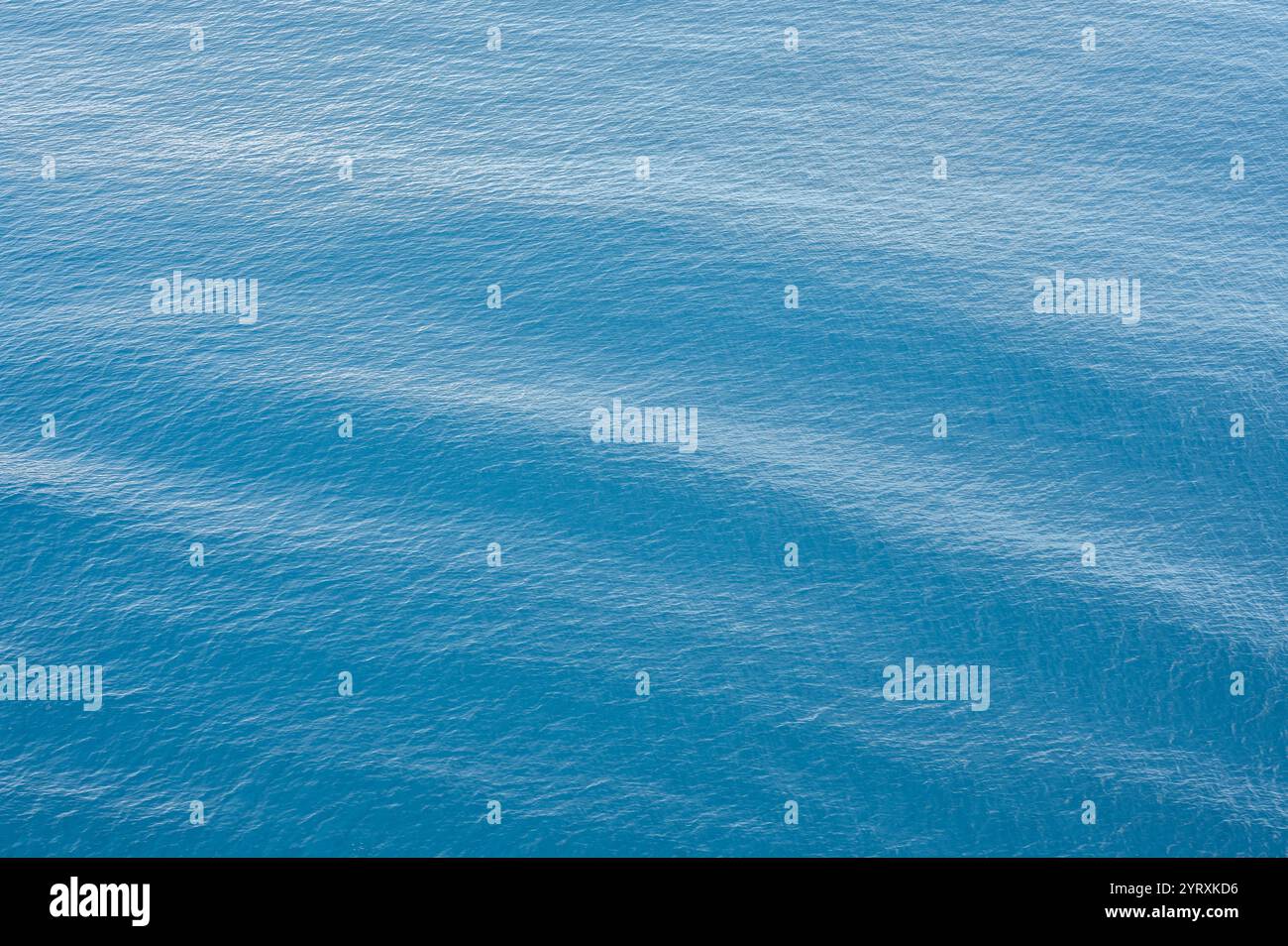 tranquil ocean water background with soft waves and subtle ripples ...